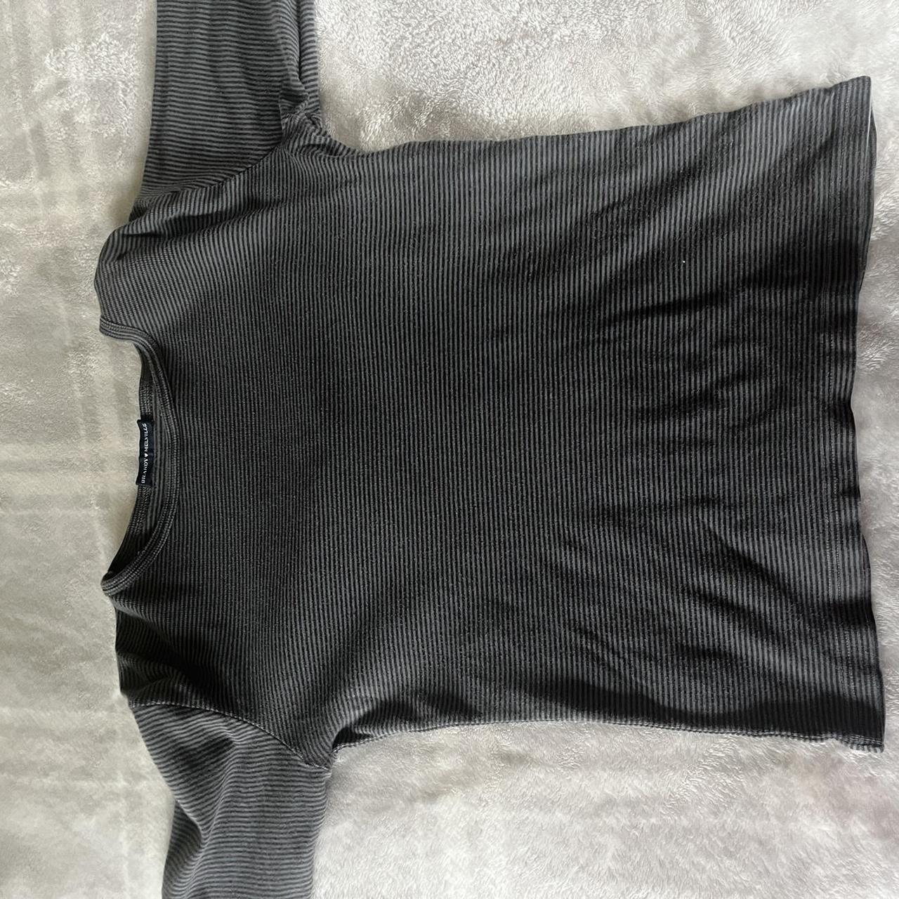 this is a stripped brandy melville black and dark... - Depop