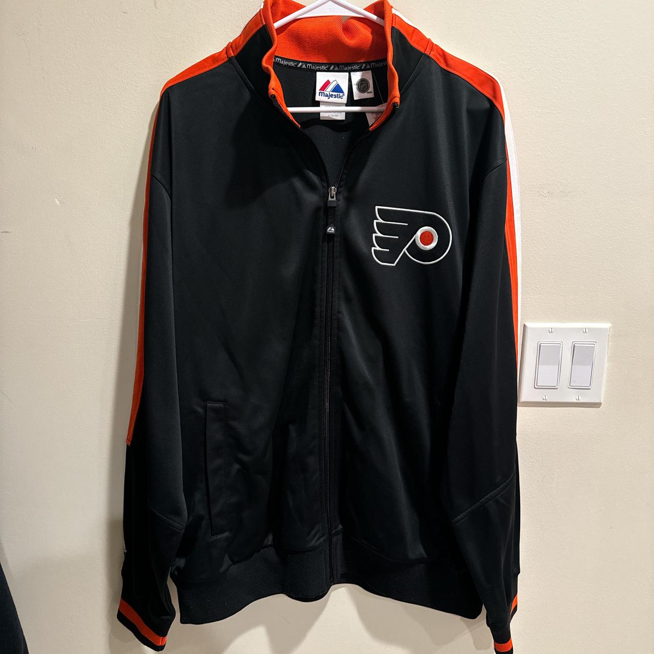 Black and orange Philadelphia Flyers zip-up jacket... - Depop