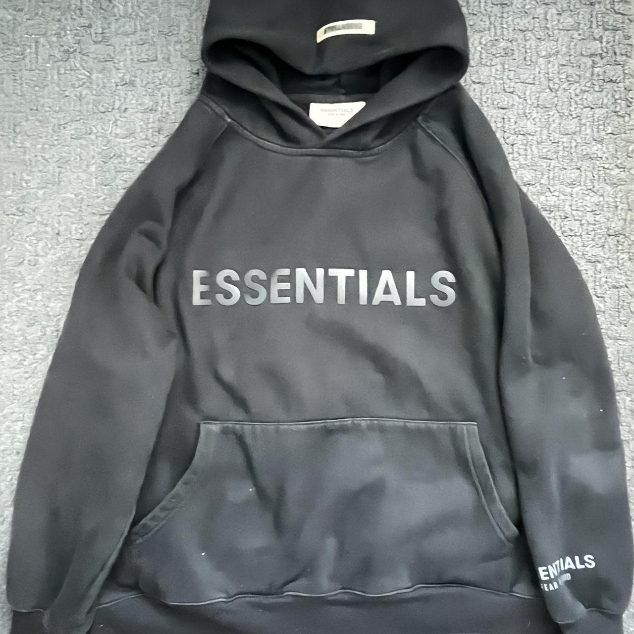 Black Essentials Fear of God front logo hoodie Used,... - Depop