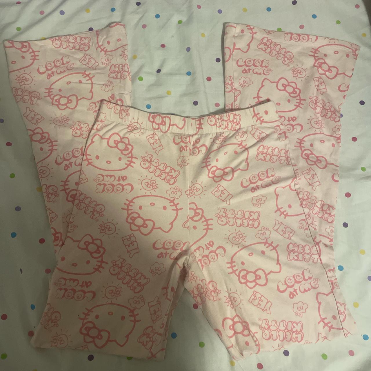 Pink Hello Kitty flare leggings No rips nor... - Depop