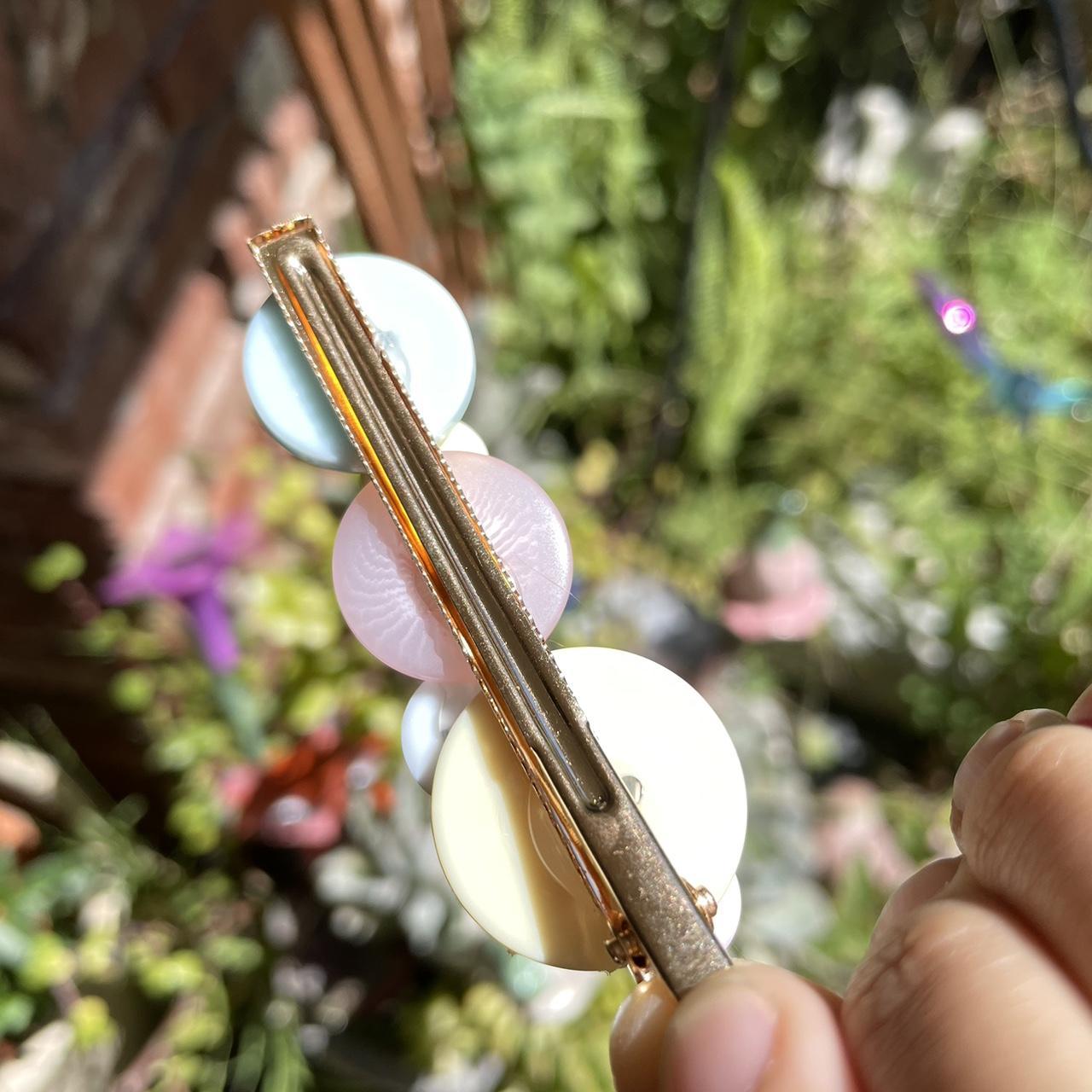 3D button hair clip with a pastel buttons... - Depop