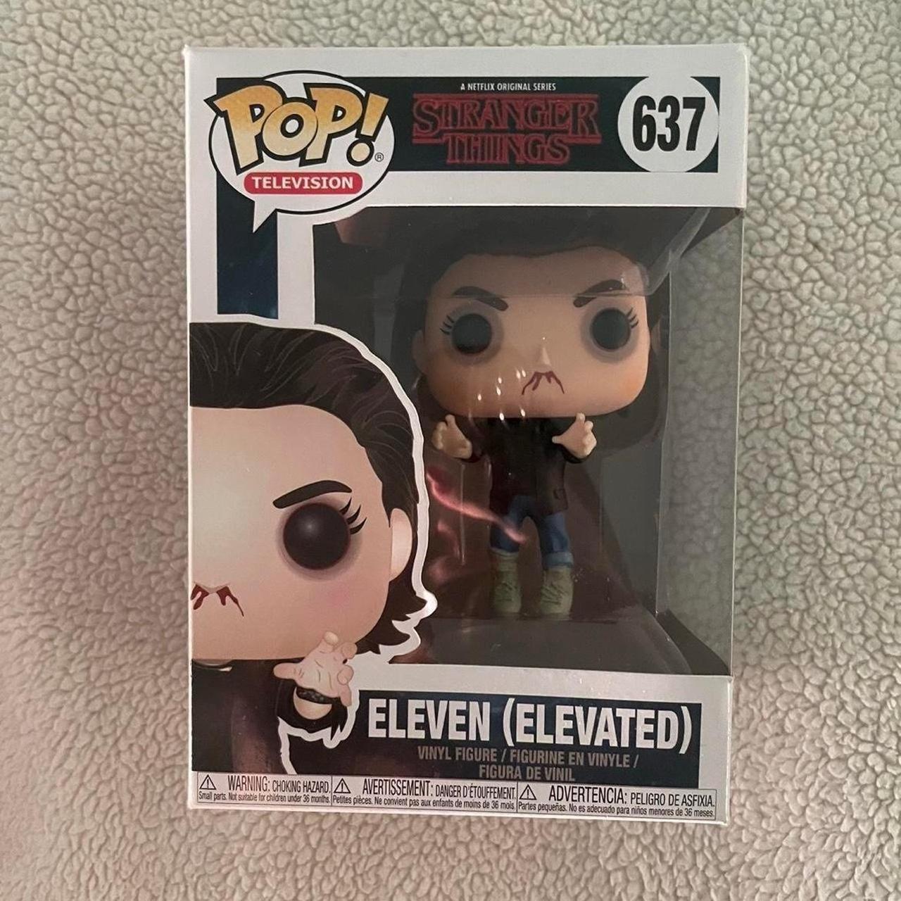 eleven elevated from stranger things funko pop in... - Depop