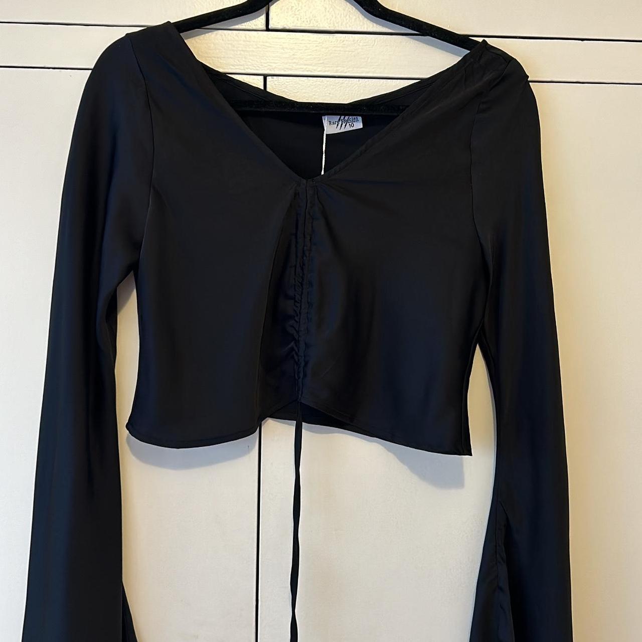 Silky black draw string top with flared... - Depop