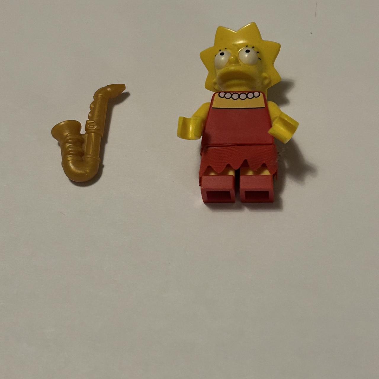 Lisa Simpson LEGO figurine from the early... - Depop