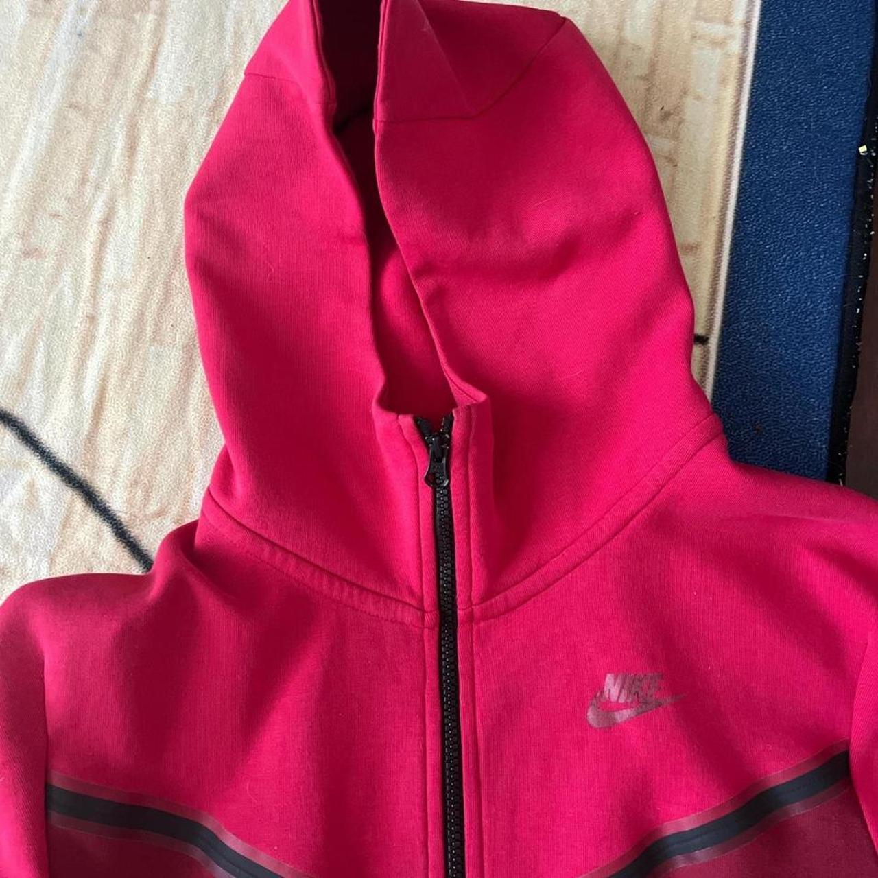 red nike tech fleece worn like twice bought from... - Depop