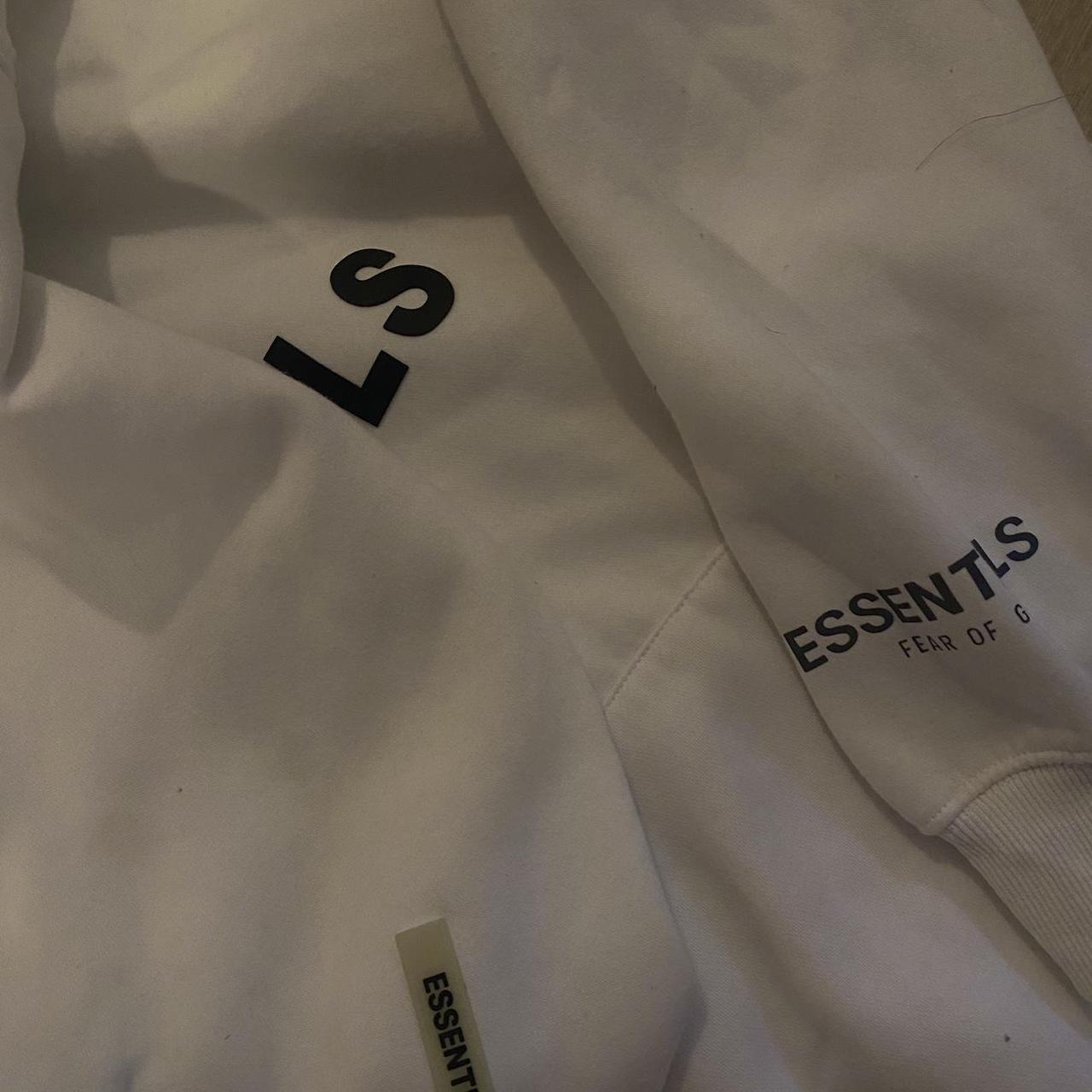 white essentials hoodie - Depop