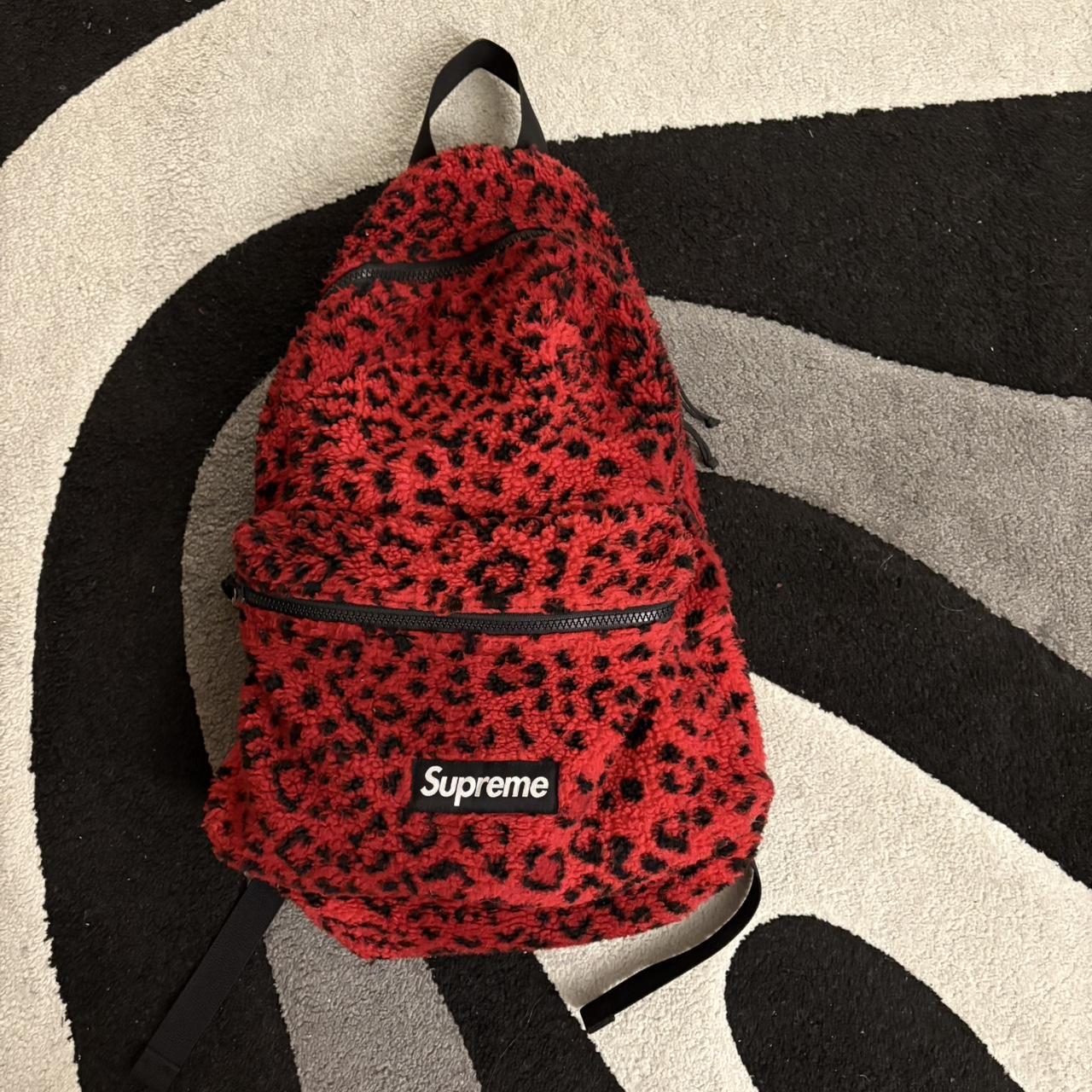 Red cheetah print supreme fleece backpack Fits... | Depop
