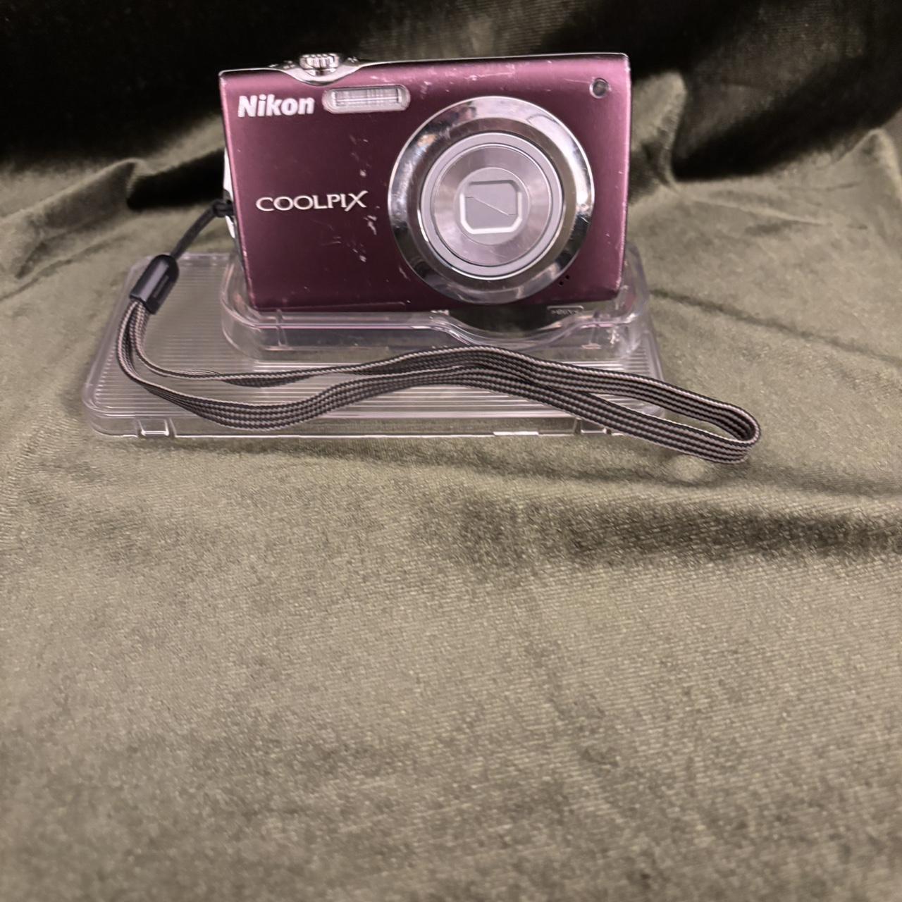 Purple Nikon Coolpix S1000 digital camera with... - Depop