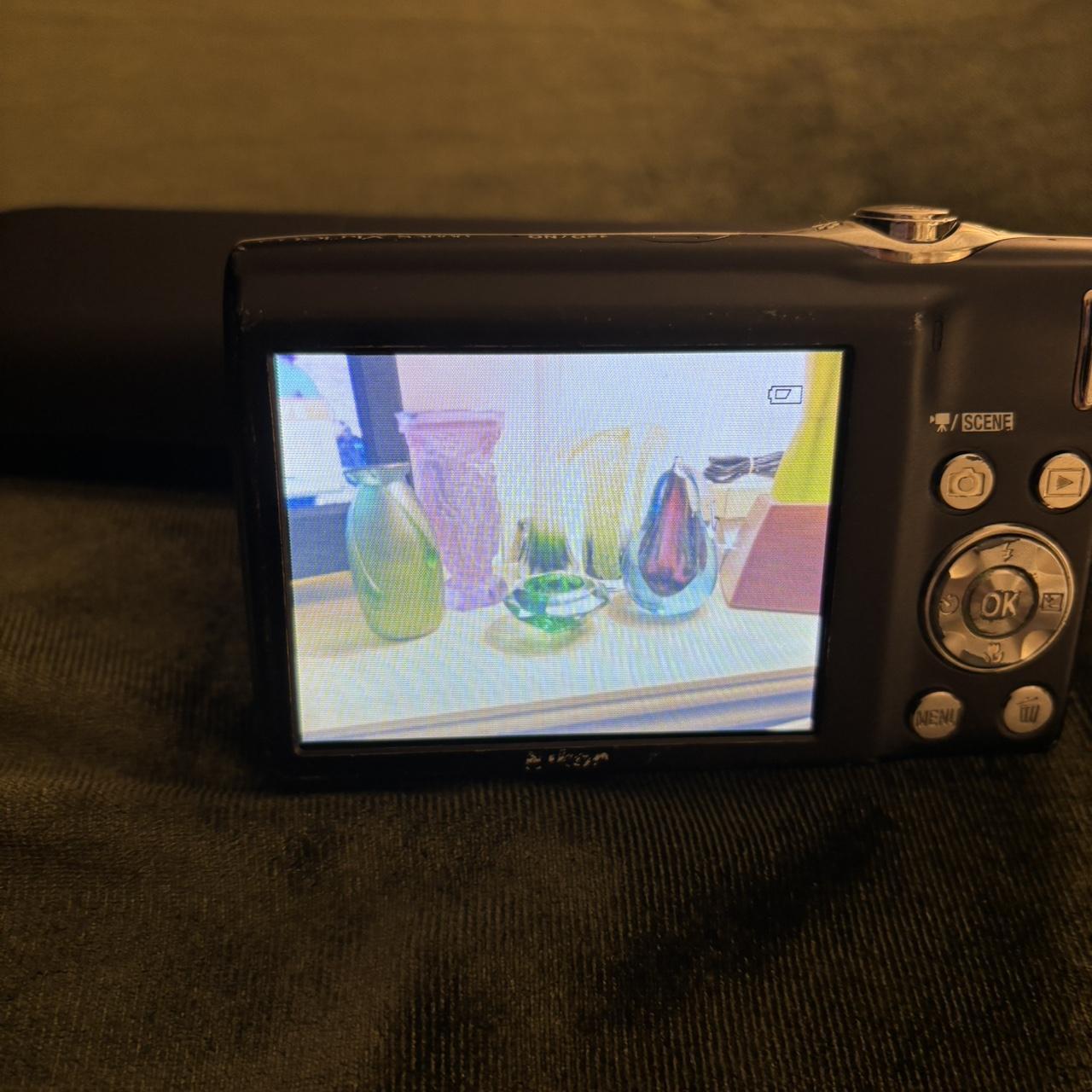 Purple Nikon Coolpix S1000 digital camera with... - Depop