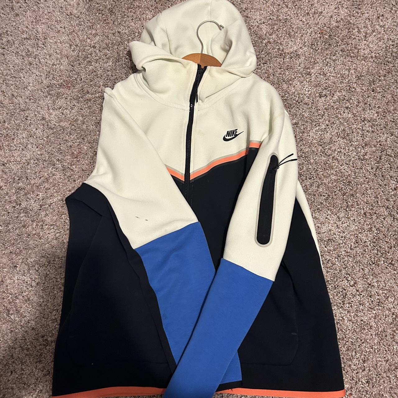 Cool Nike tech has a small pen stain - Depop