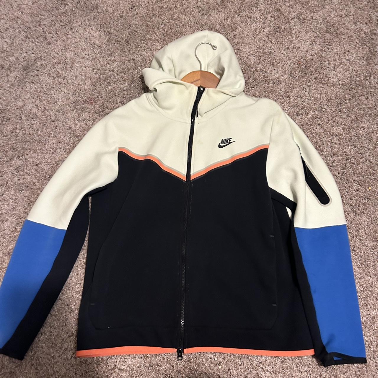 Cool Nike tech has a small pen stain - Depop