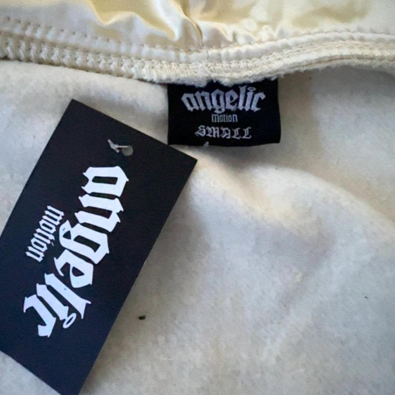 Men’s small Cream Angelic motion zip up hoodie.... - Depop