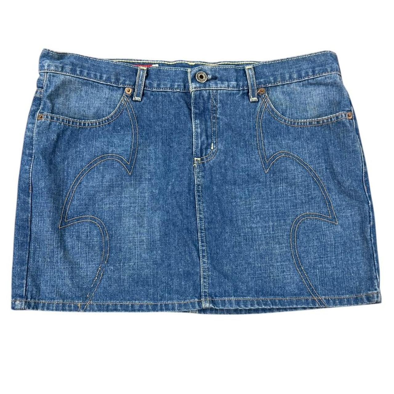 A348- Guess Mini blue denim skirt with unique arrow... | Depop