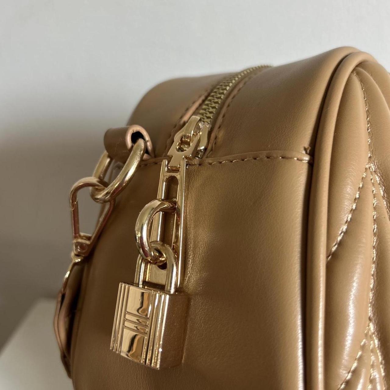 Very cute Tan Miu Miu mini bag with gold hardware... | Depop