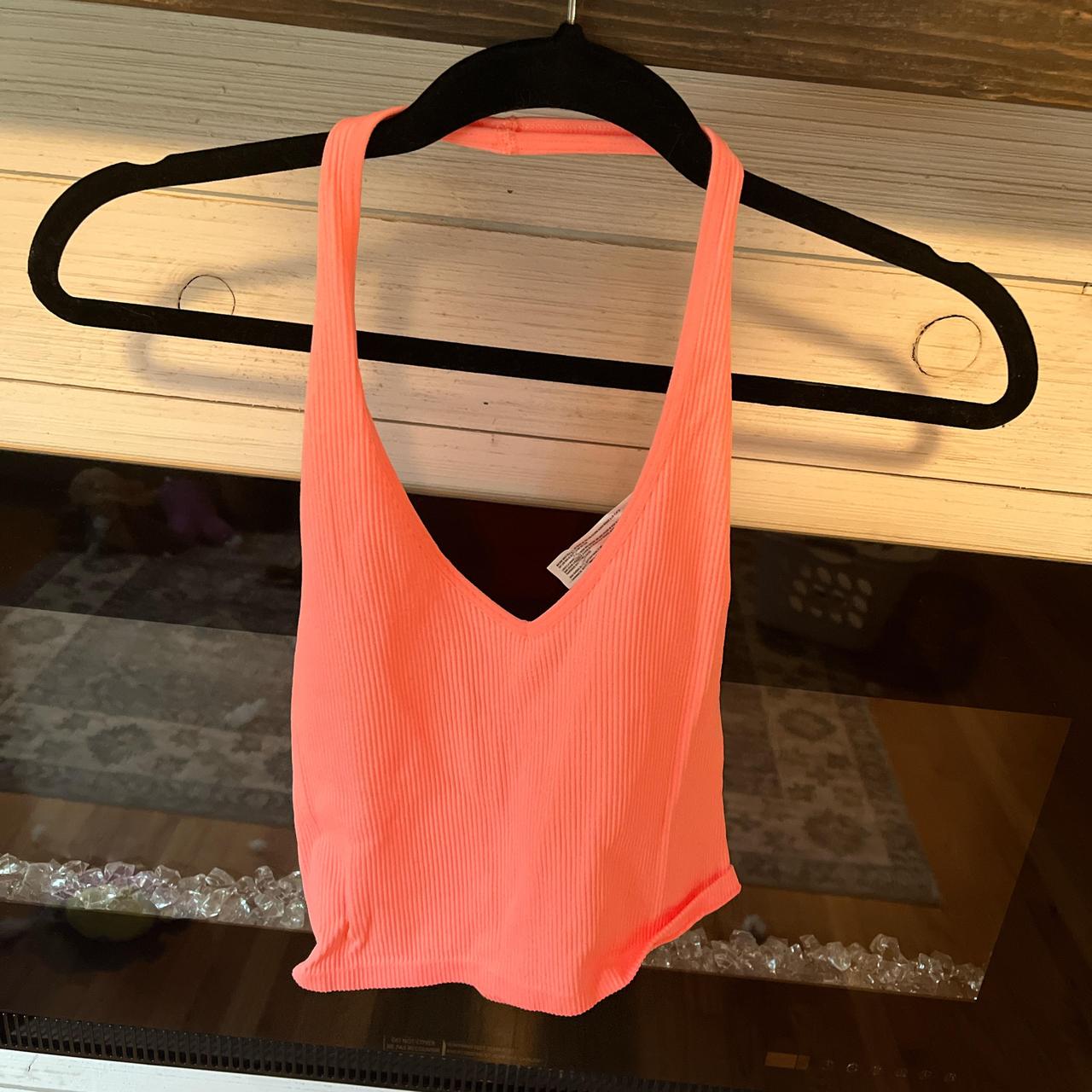 Three out from under halter cropped tops. One in a... - Depop