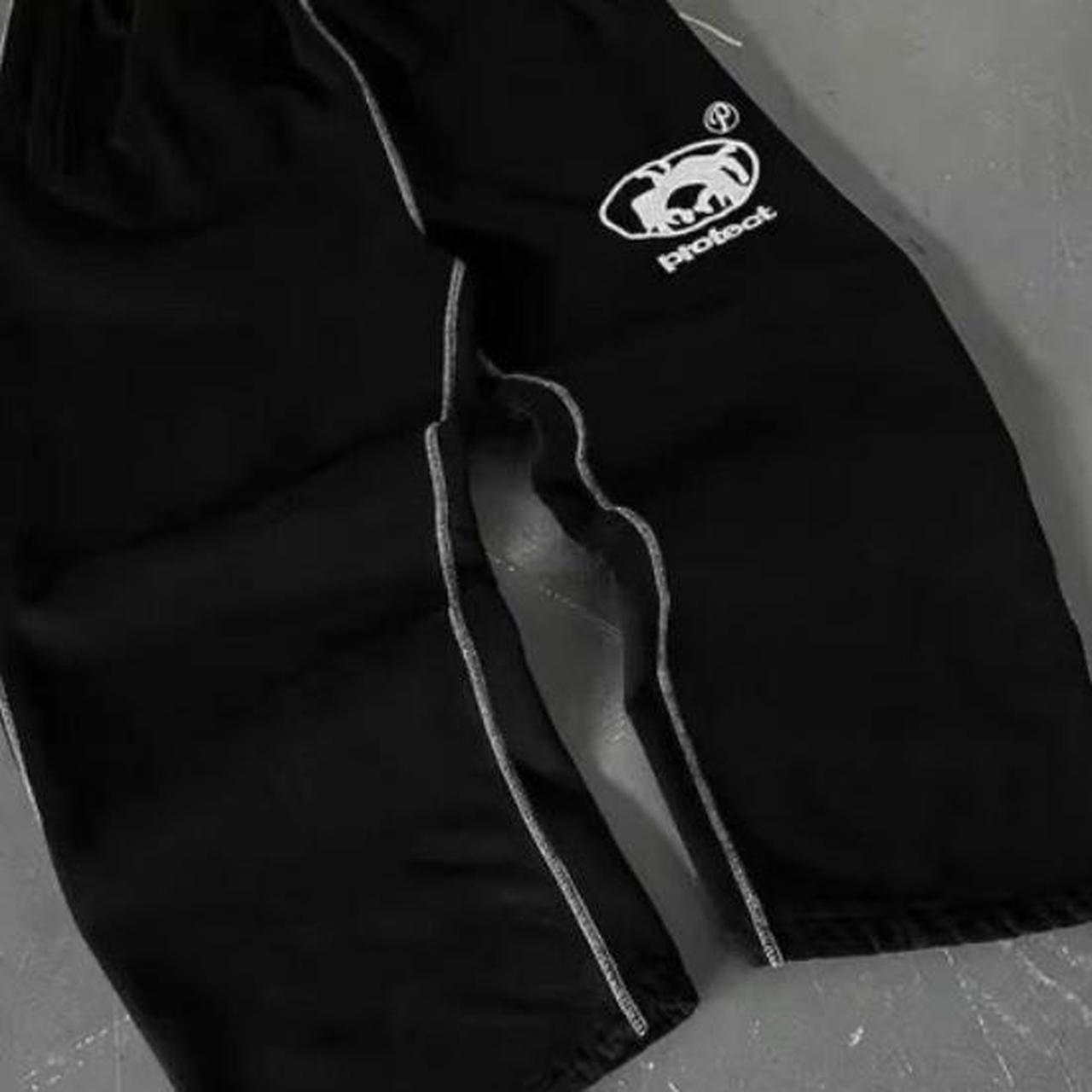 Protect London Joggers - Depop