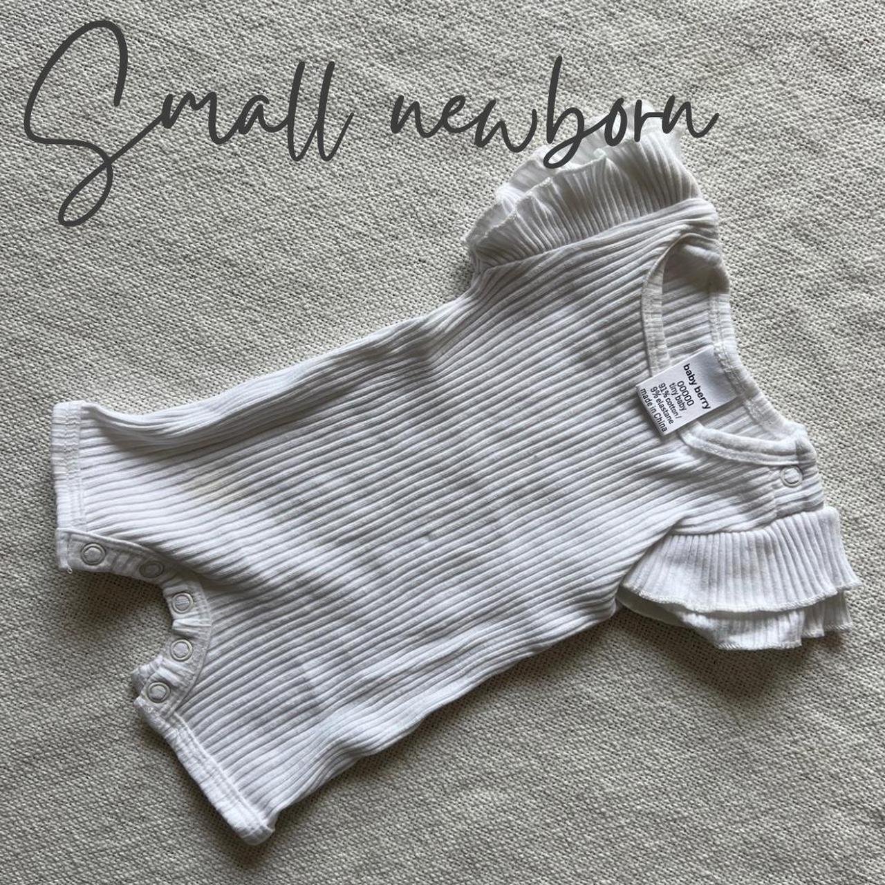 Short sleeved white ribbed romper. Size: 00000... - Depop