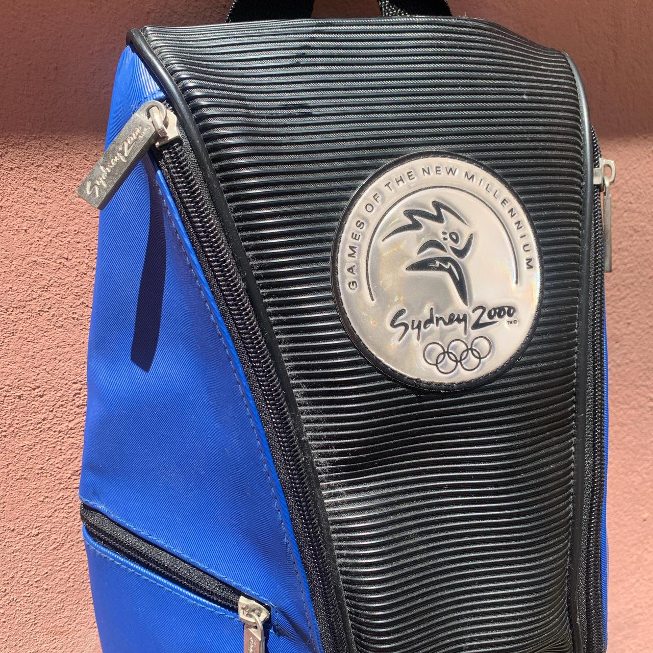 Blue and black Sydney 2000 Olympics backpack small ... | Depop
