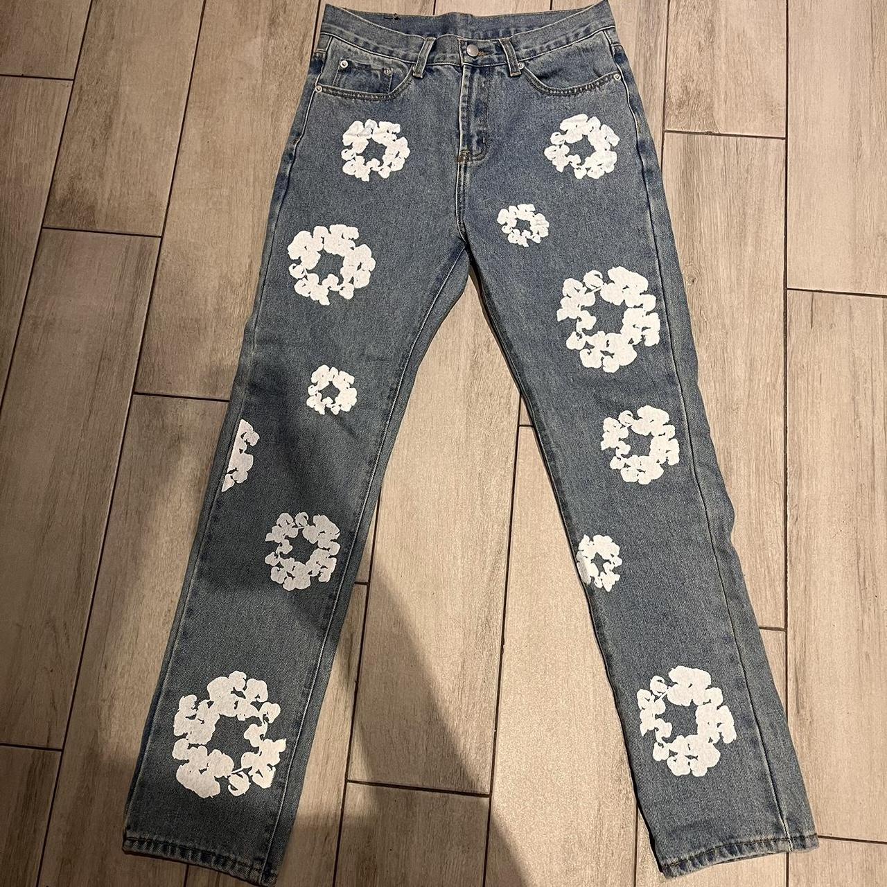 Denim Tears jeans with floral pattern - Depop