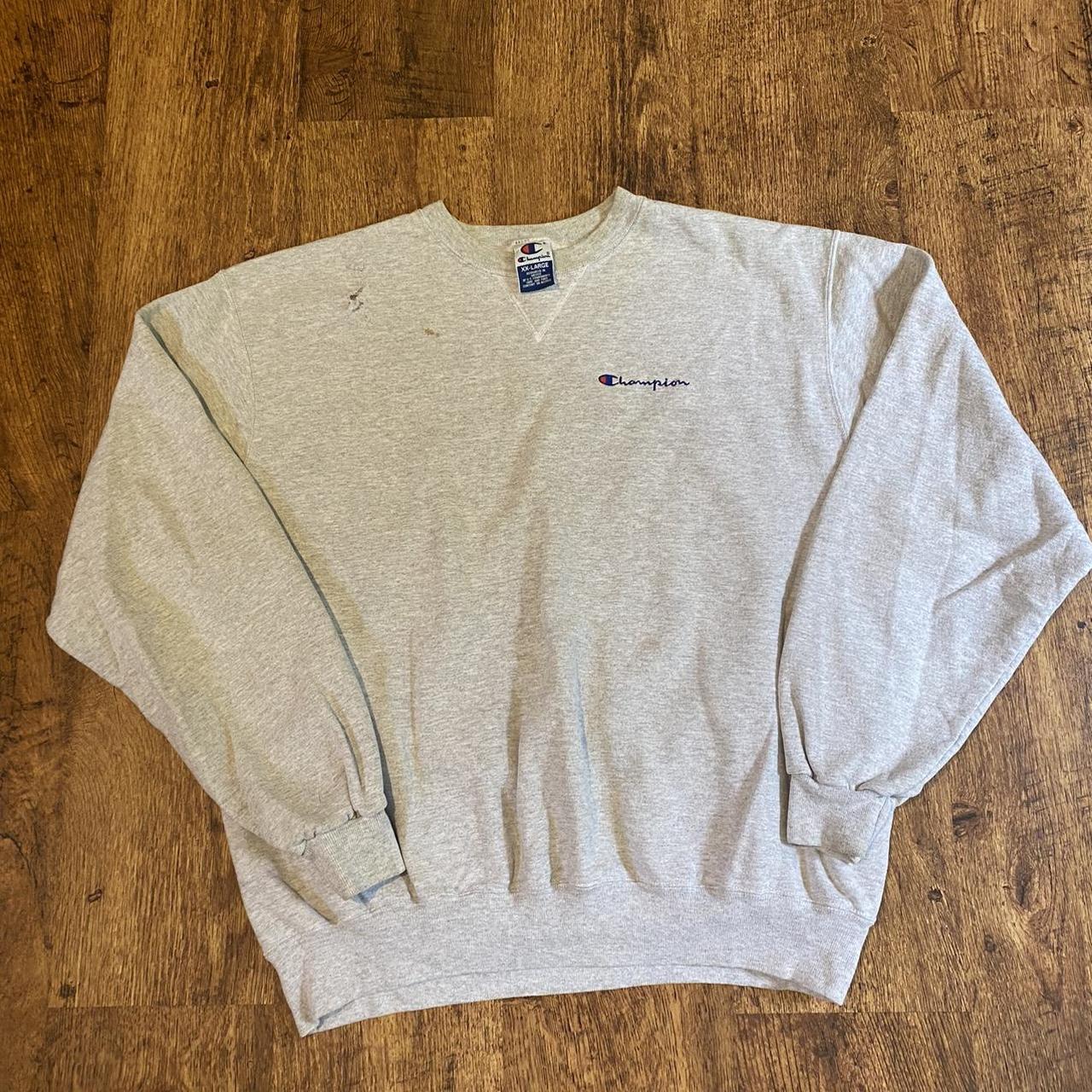 Champion crewneck sweater size XXL small hole about... - Depop