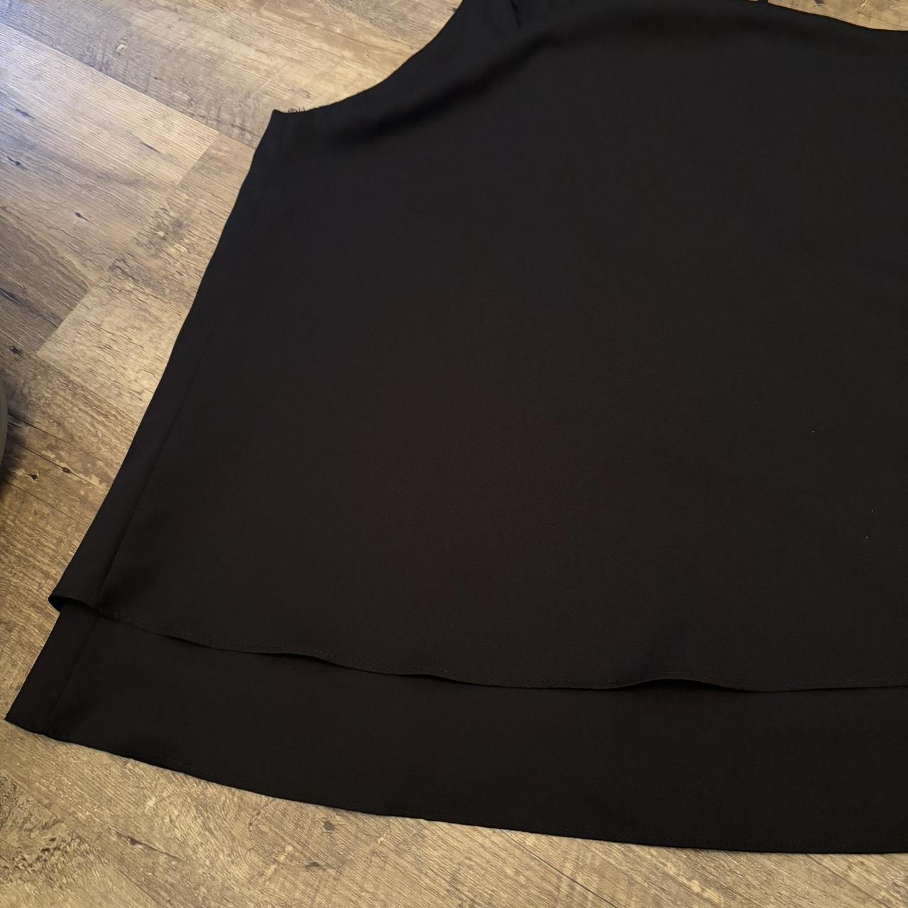 Black Strappy Top This top is very flowy and... - Depop