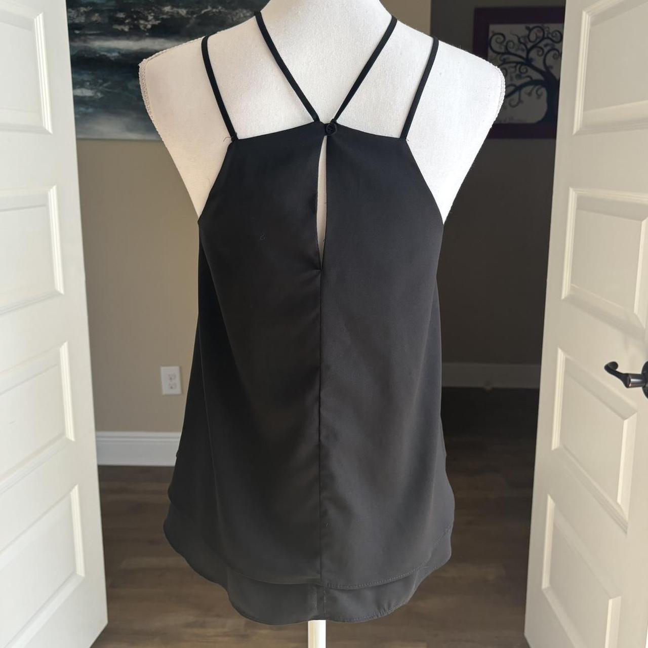 Black Strappy Top This top is very flowy and... - Depop