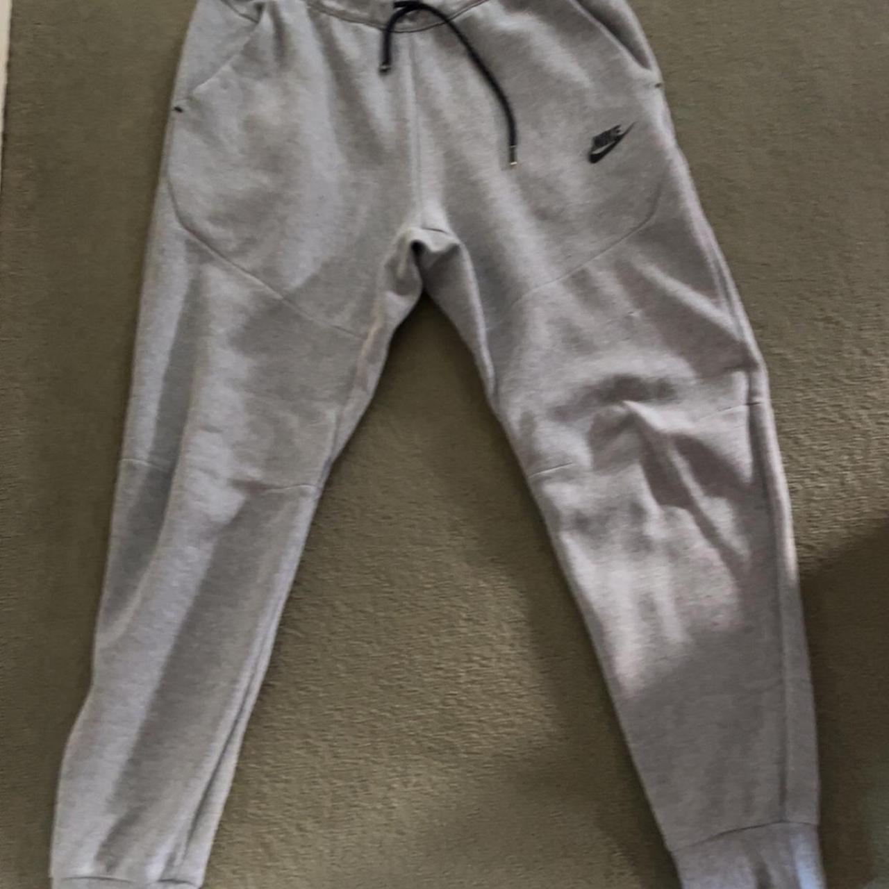 Grey Nike tech fleece tracksuit Rip on leg but... - Depop