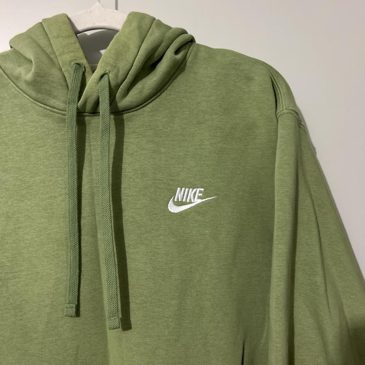 Green Nike hoodie with white logo | Depop