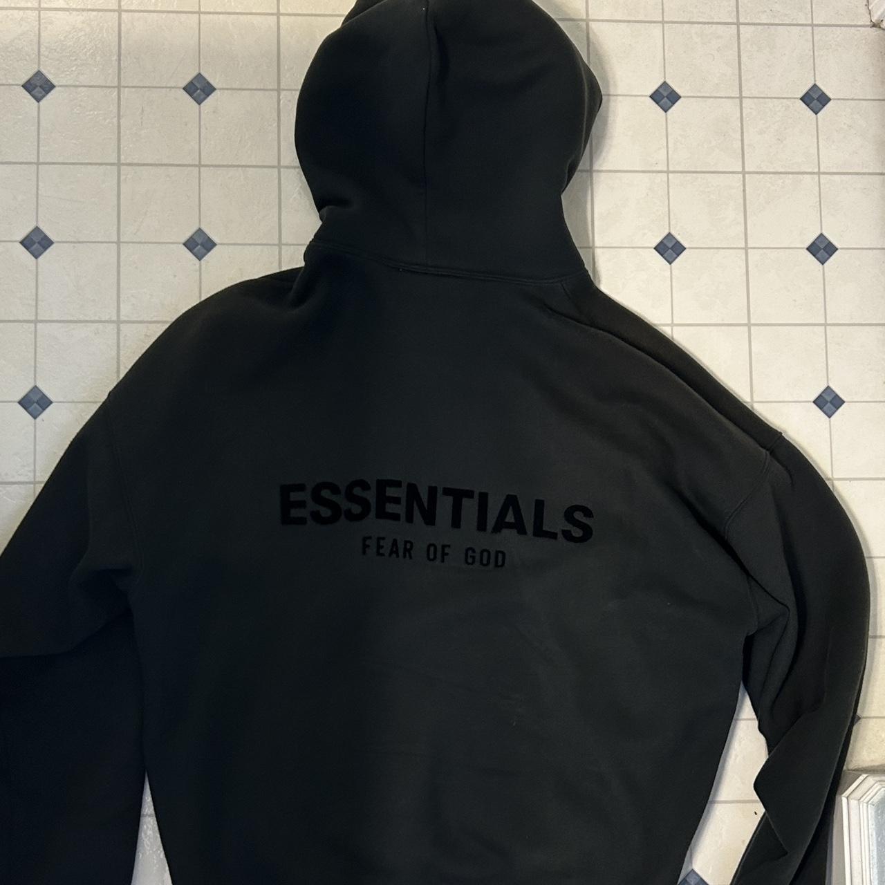 Size small, Black Essentials Hoodie. A little faded... - Depop