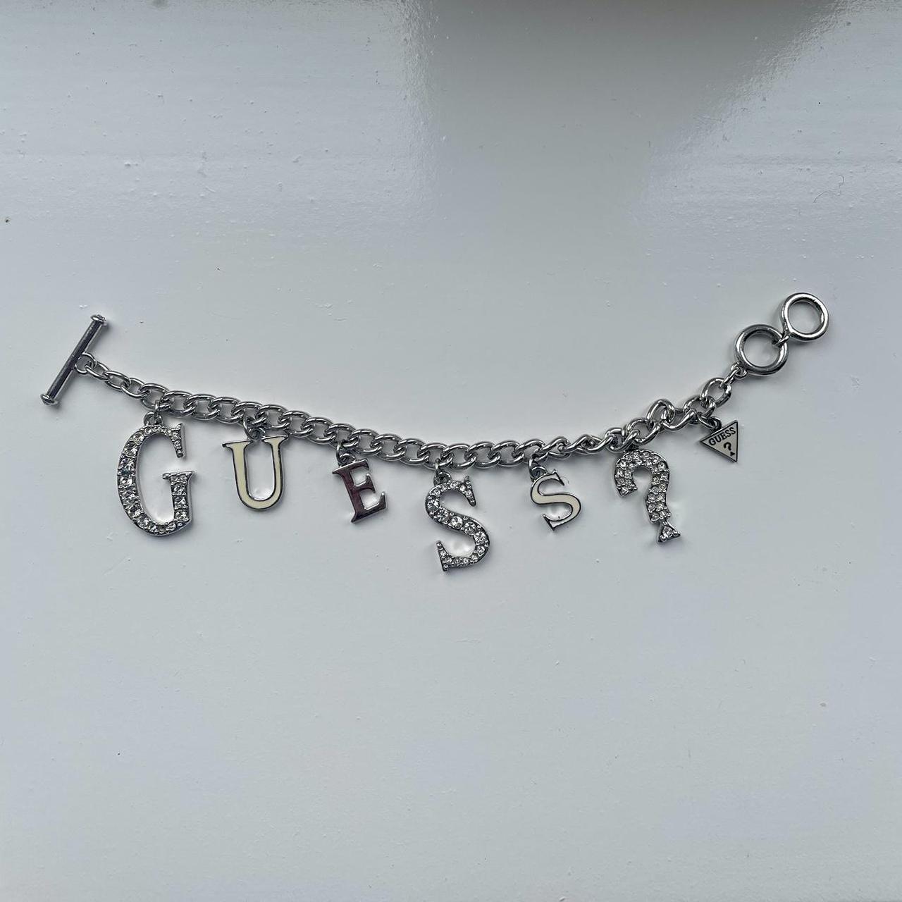 Guess Silver Letter Logo Bracelet • Six charms... - Depop