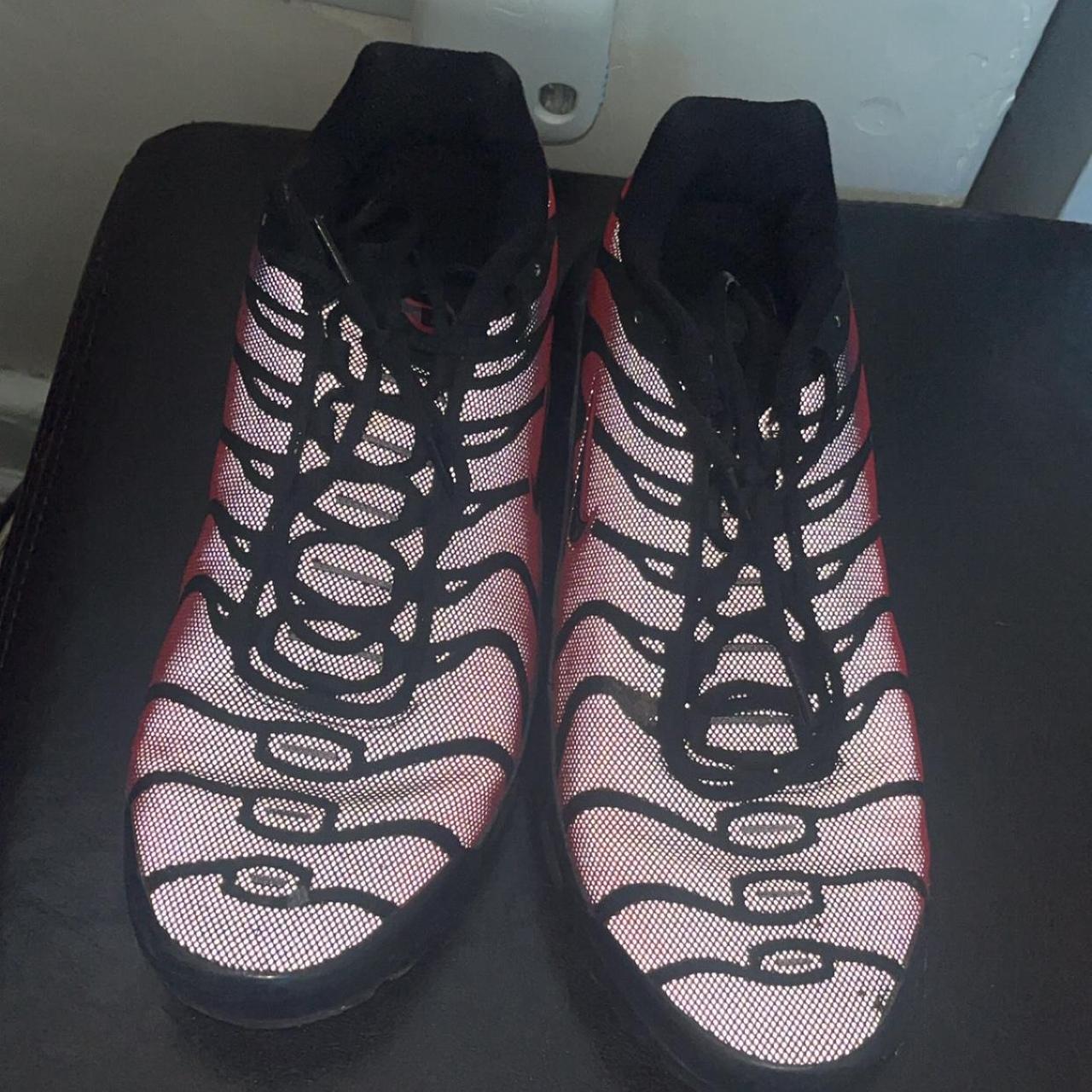 Nike Air Max Plus TN trainers in black and red... | Depop