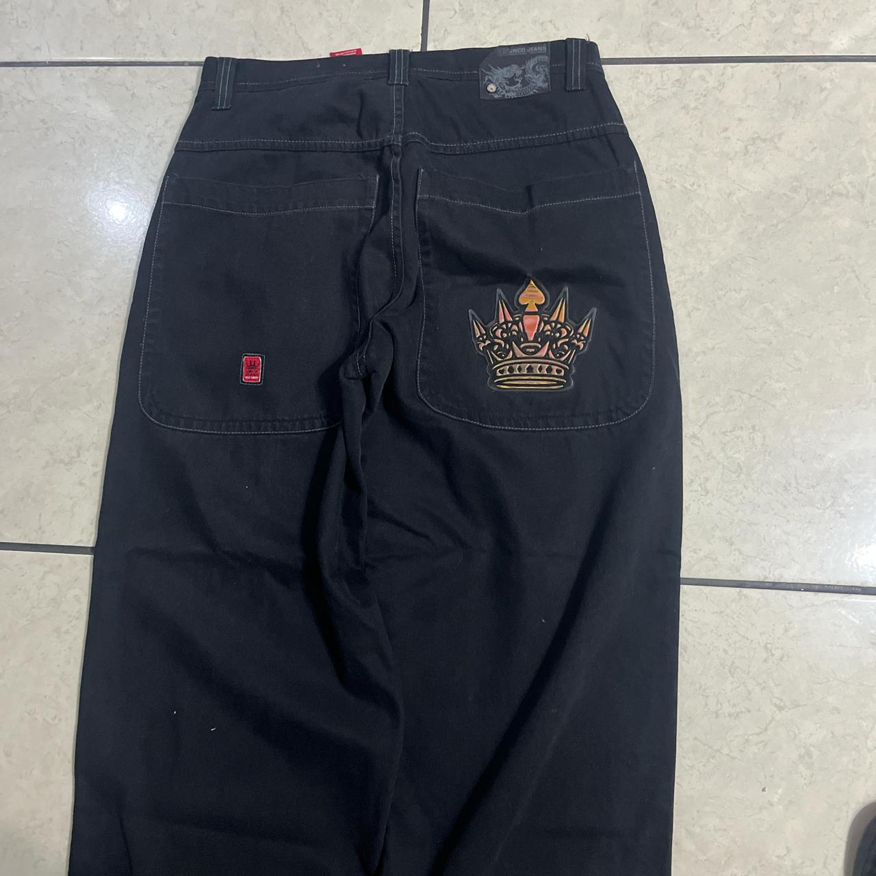 Black JNCO jeans with gold crown detailing... | Depop