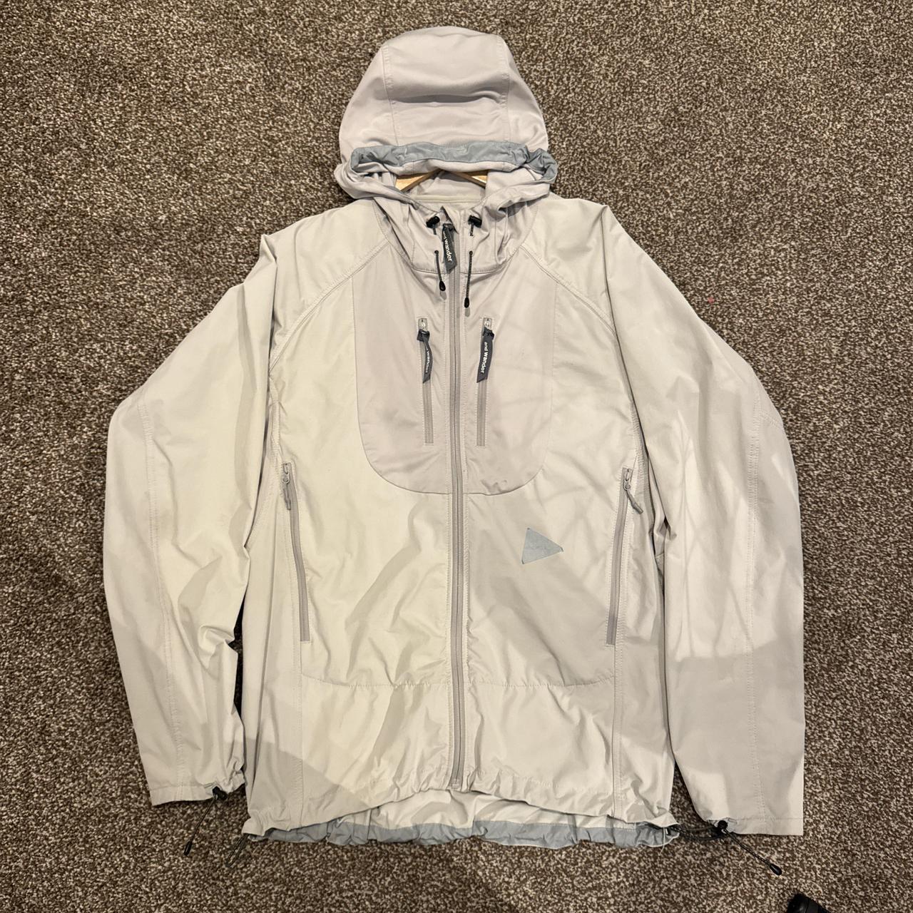 And wander jacket Grey/white Size L 9.5/10 | Depop