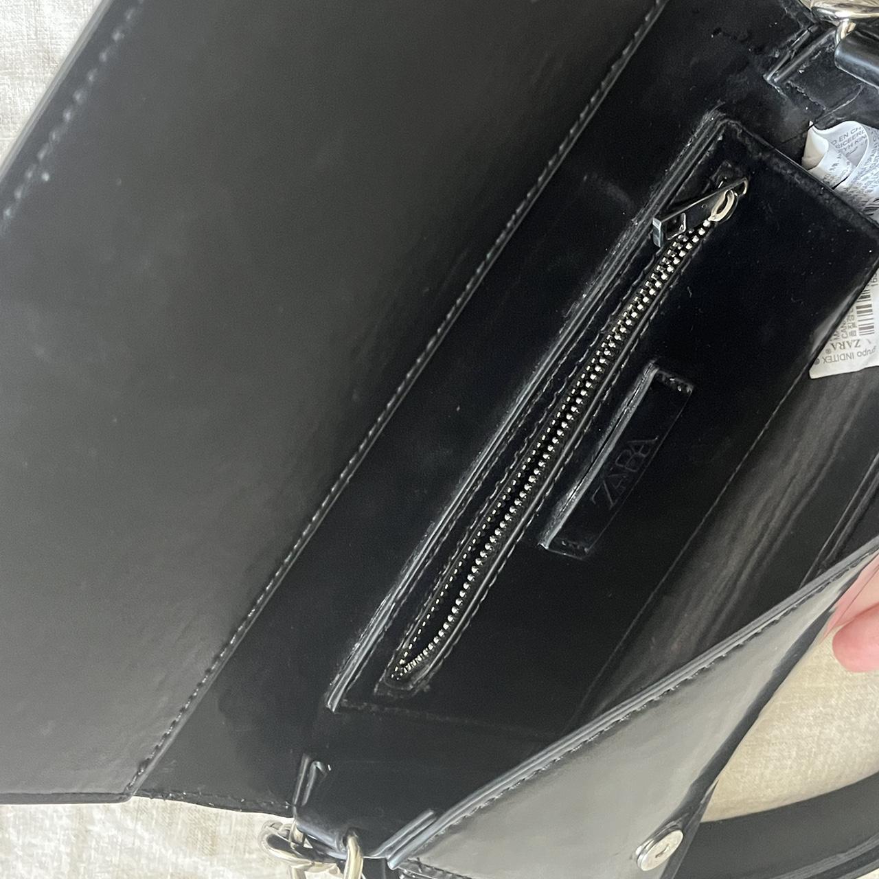 Black faux leather ZARA purse with silver buckles... - Depop