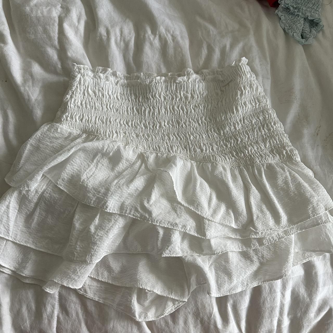 White ruffle mini skort with a stretchy waistband... - Depop