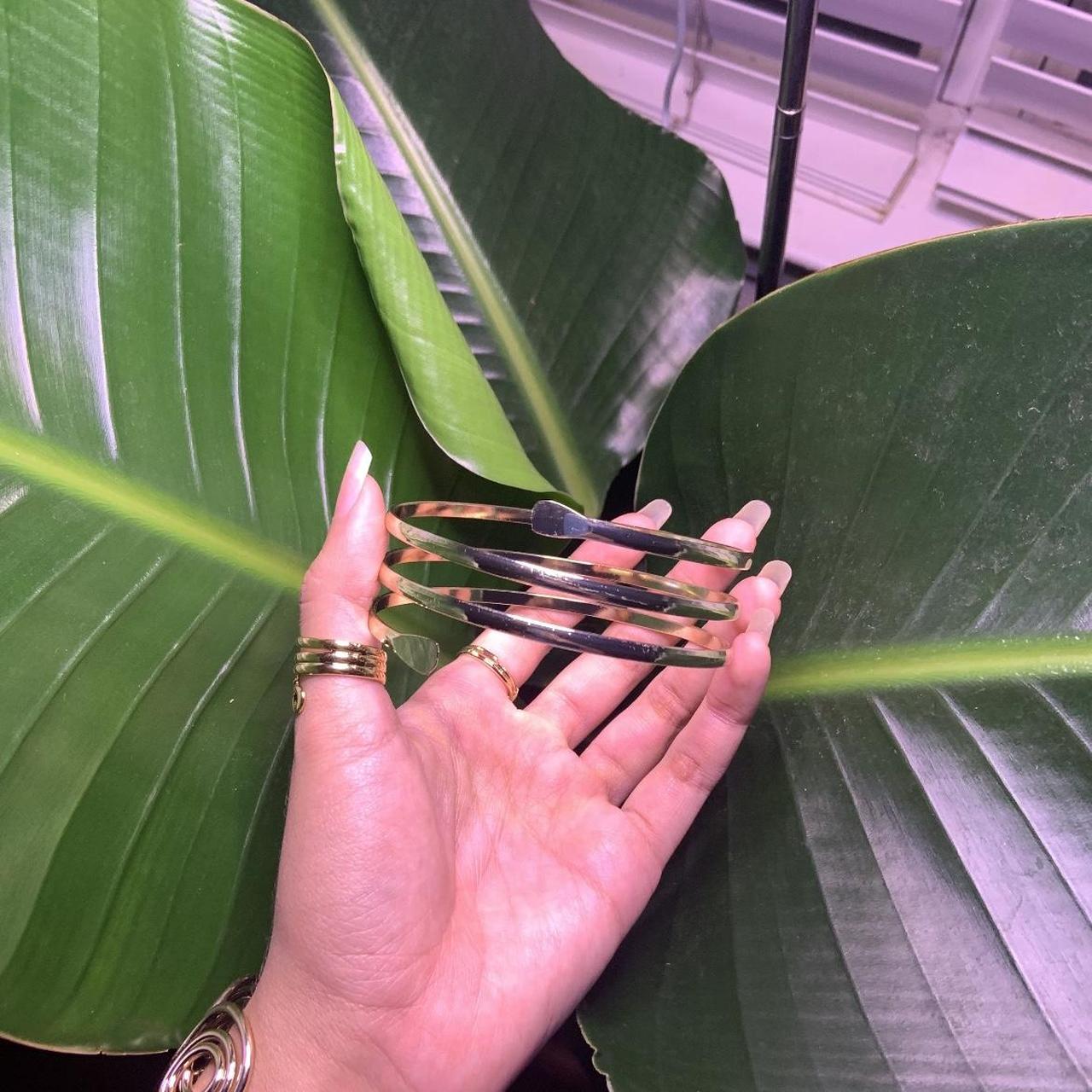 Golden arm cuff Get a discount with the details in... - Depop