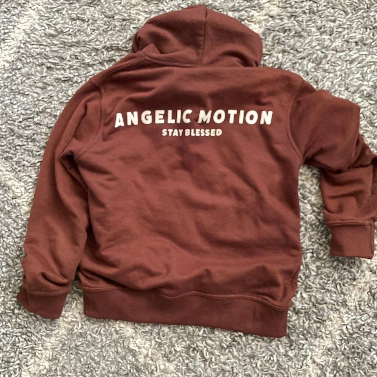 Medium Angelic Motion hoodie Worn once - Depop
