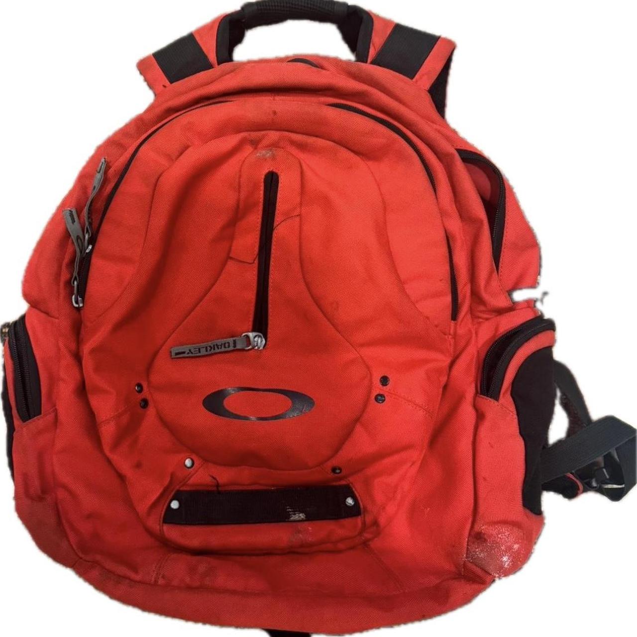 My 2000s red vintage oakley backpack. A little dirty... - Depop