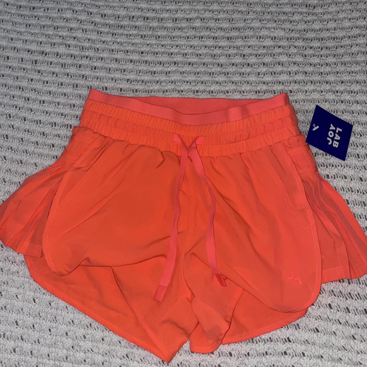 Medium, orange running shorts - Depop