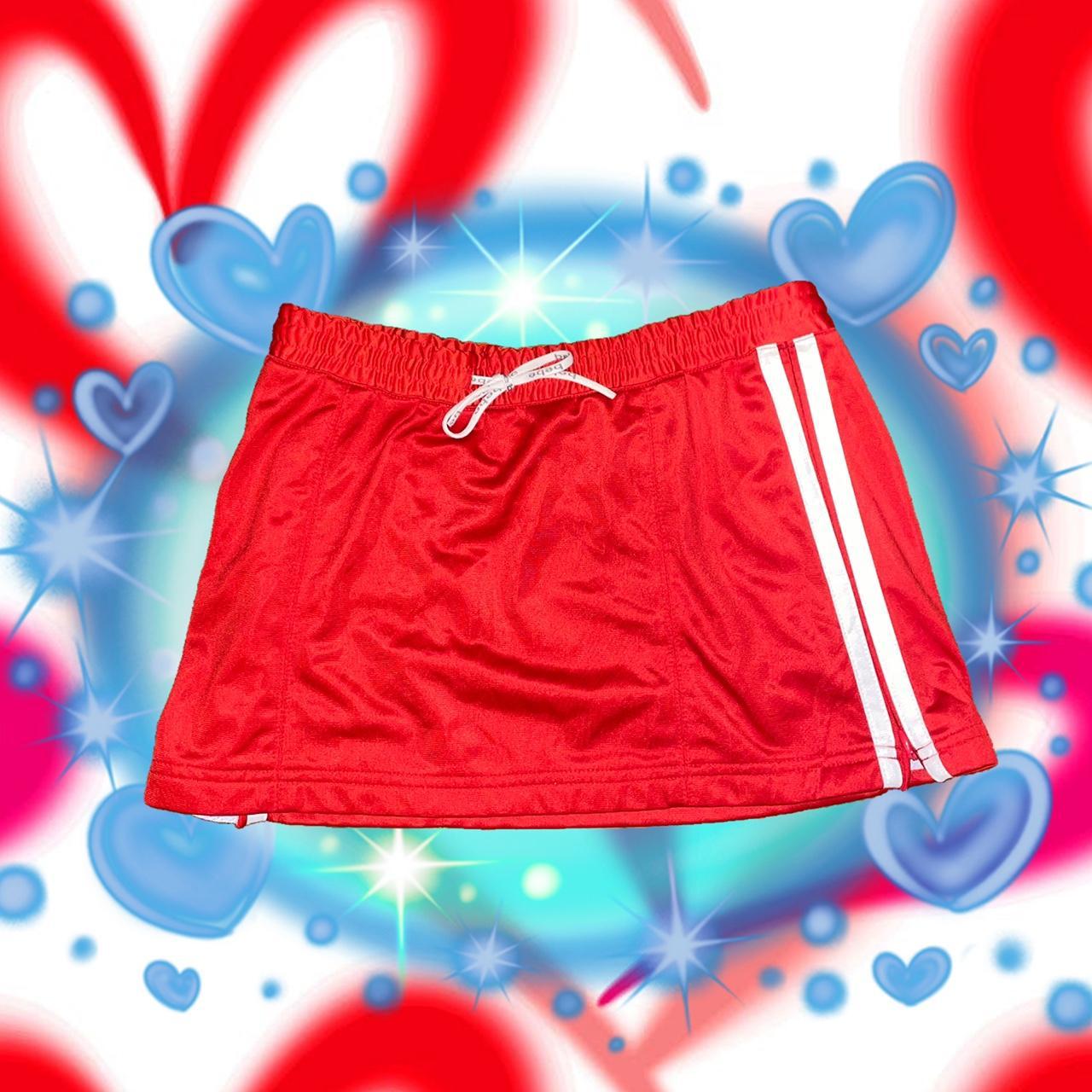 Super cute unique Bebe sporty miniskirt. Both sides... - Depop