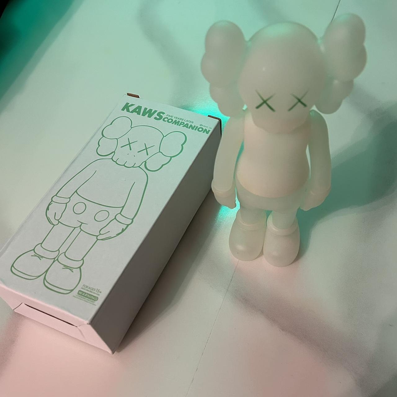 Kaws glow in the dark eight inch figurine brand new... - Depop