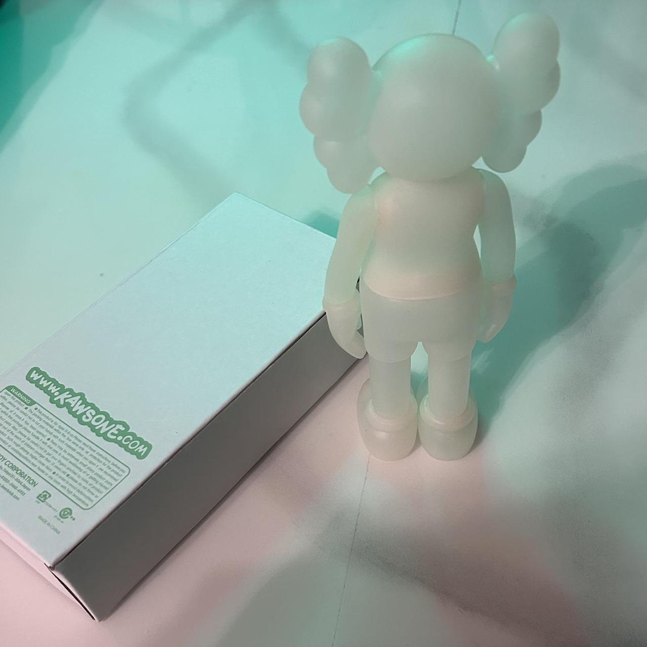 Kaws glow in the dark eight inch figurine brand new... - Depop