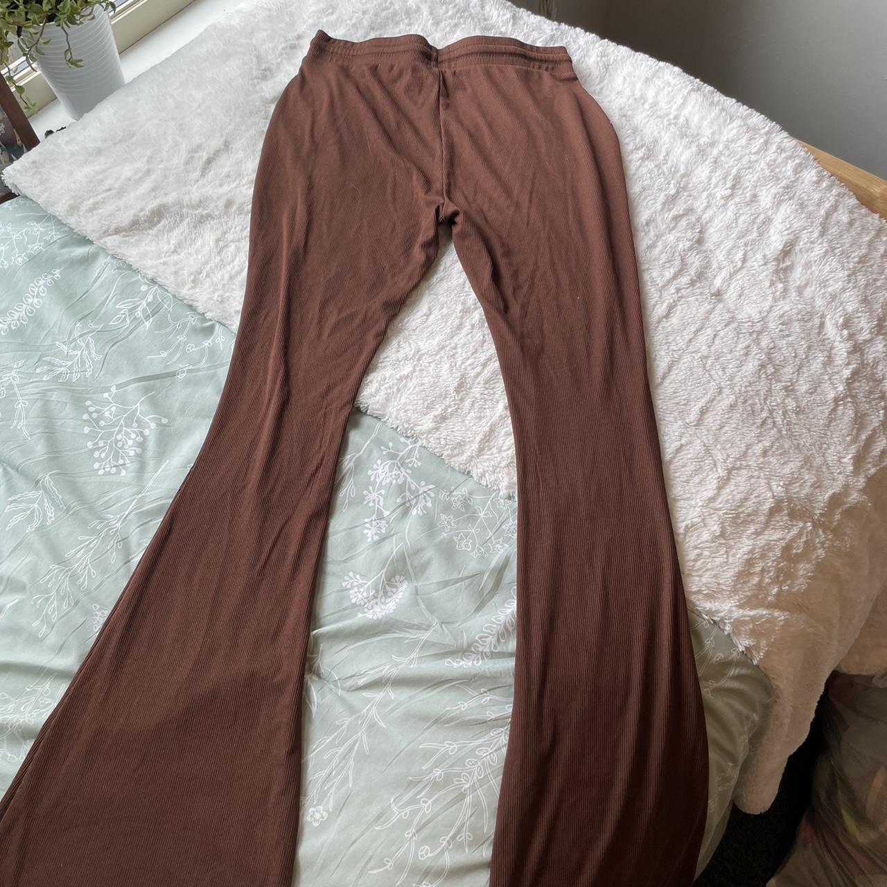 brown flare yoga pants from Rue 21 - Depop