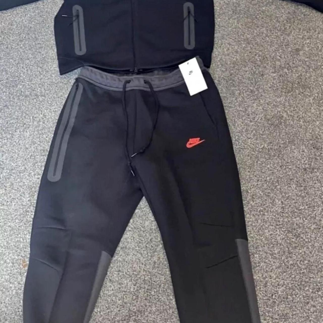 Black and red nike tech size M Got size S too - Depop