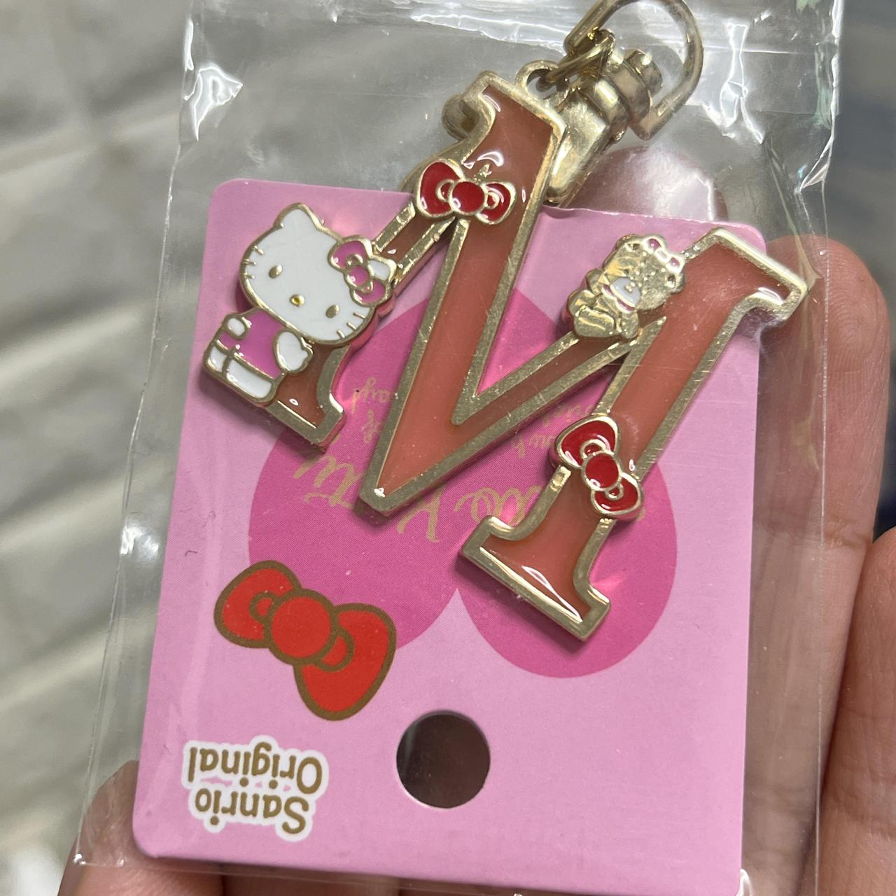Sanrio original Hello Kitty metal keychain Letter... - Depop