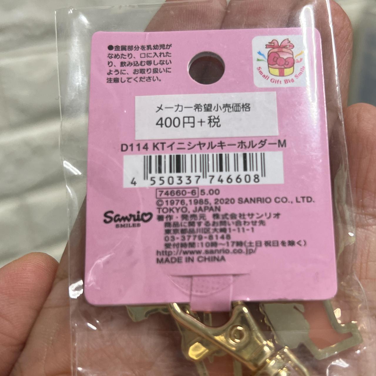 Sanrio original Hello Kitty metal keychain Letter... - Depop