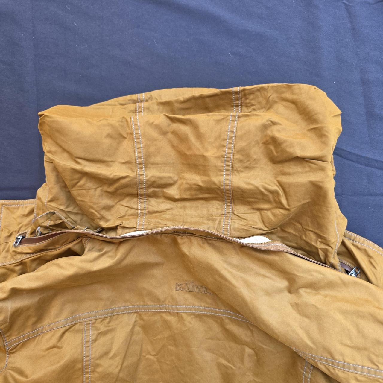 KUHL tan raincoat, water-resistant fabric with... | Depop