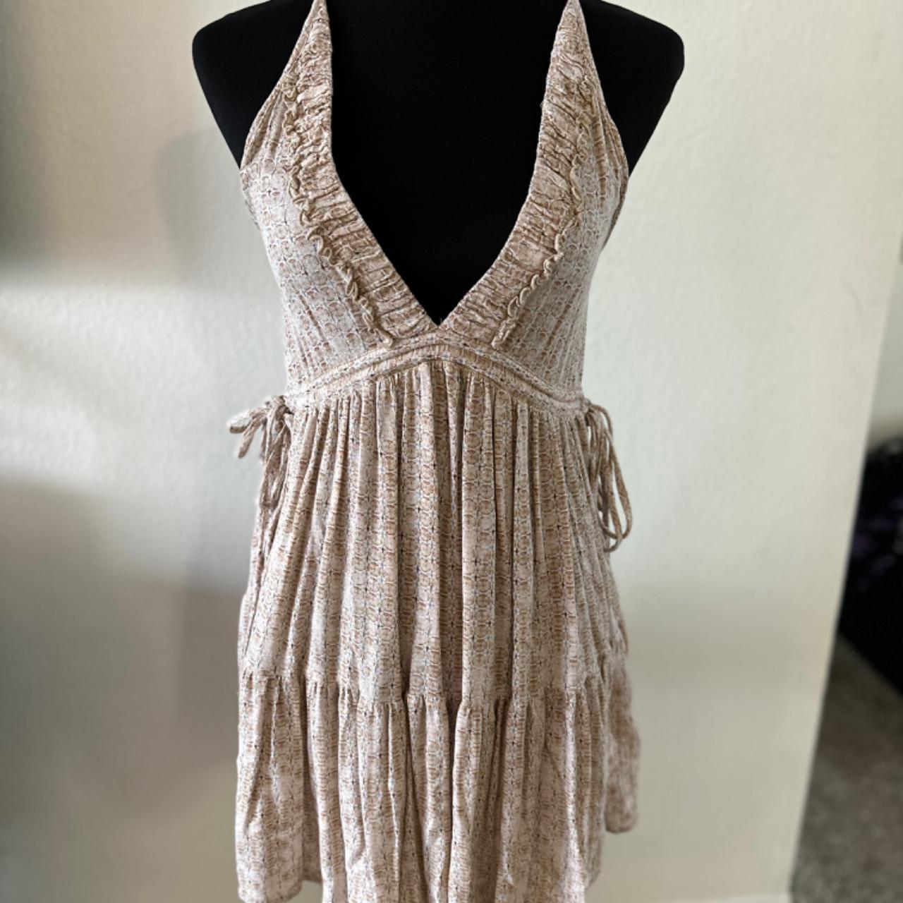 Small. Low neck mini dress. Side tie straps to... - Depop