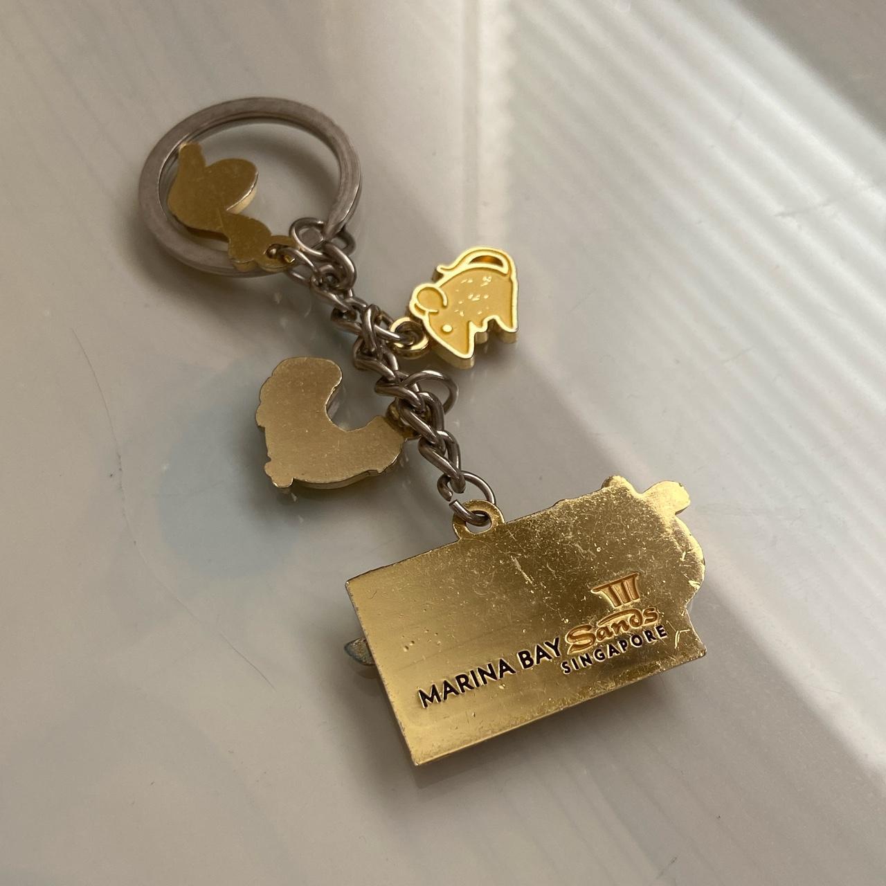 Cute keychain from singapore ♥️ A bit of wear but... - Depop