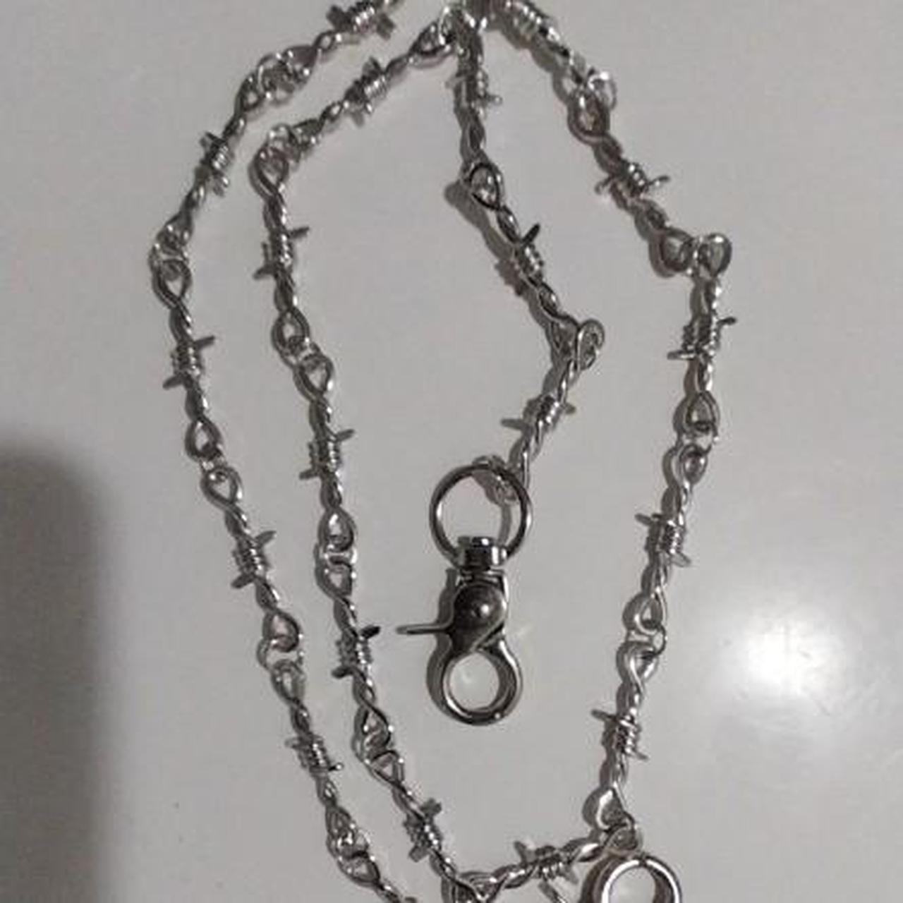 a cool Silver colored barbed wire pants chain #goth... | Depop